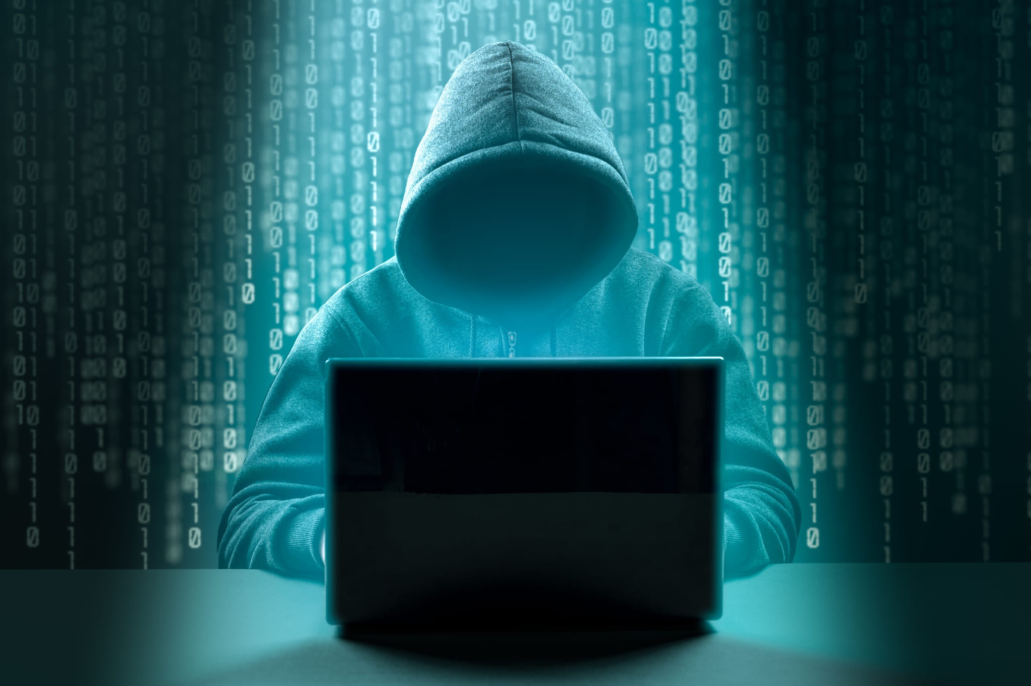 Hacker attack. Dangerous Hooded Hacker Breaks into Government Data Servers. Cybersecurity ...
